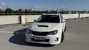 White Subaru Impreza WRX 2011 in Vilnius, with an engine capacity of 2.46 L and mileage of 226 thousand km for 8500 €, photo  on AUTOMOTO.COM.LV