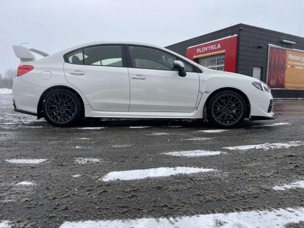 White Subaru Impreza WRX 2017 in Vilnius, with an engine capacity of 2.47 L and mileage of 84 thousand km for 25300 €, photo 7 on AUTOMOTO.COM.LV