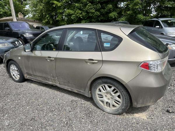 Yellow Subaru Impreza 2008 in Vilnius, with an engine capacity of 2.00 L and mileage of 270 thousand km for 1400 €, photo 6 on AUTOMOTO.COM.LV