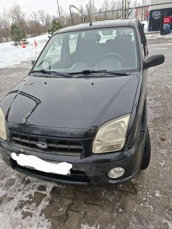 Black Subaru Justy 2006 in Panevezys, with an engine capacity of 1.33 L and mileage of 206 thousand km for 1199 €, photo 1 on AUTOMOTO.COM.LV