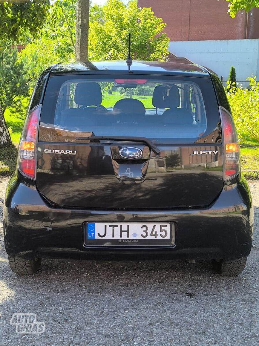 Black Subaru Justy 2007 in Klaipeda, with an engine capacity of 1.00 L and mileage of 202 thousand km for 1299 €, photo 5 on AUTOMOTO.COM.LV