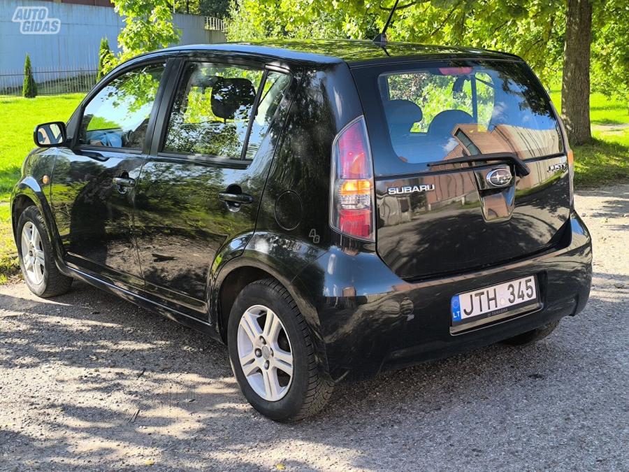 Black Subaru Justy 2007 in Klaipeda, with an engine capacity of 1.00 L and mileage of 202 thousand km for 1299 €, photo 6 on AUTOMOTO.COM.LV