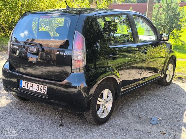 Black Subaru Justy 2007 in Klaipeda, with an engine capacity of 1.00 L and mileage of 202 thousand km for 1299 €, photo 7 on AUTOMOTO.COM.LV