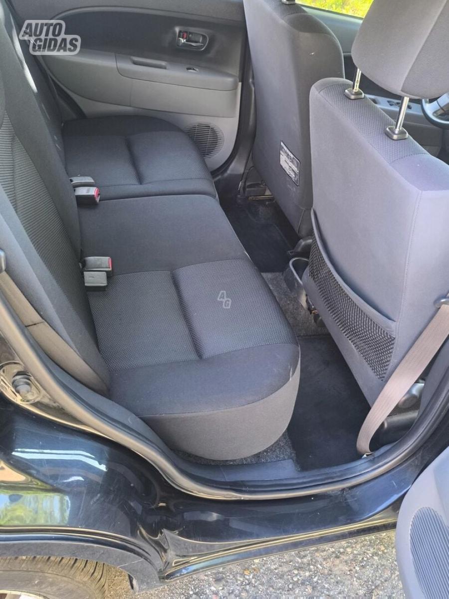 Black Subaru Justy 2007 in Klaipeda, with an engine capacity of 1.00 L and mileage of 202 thousand km for 1299 €, photo 9 on AUTOMOTO.COM.LV