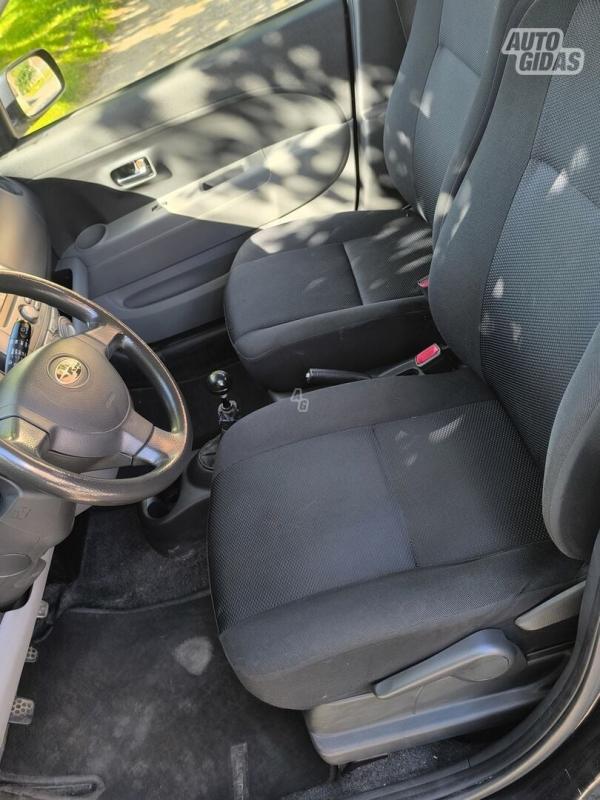 Black Subaru Justy 2007 in Klaipeda, with an engine capacity of 1.00 L and mileage of 202 thousand km for 1299 €, photo 11 on AUTOMOTO.COM.LV