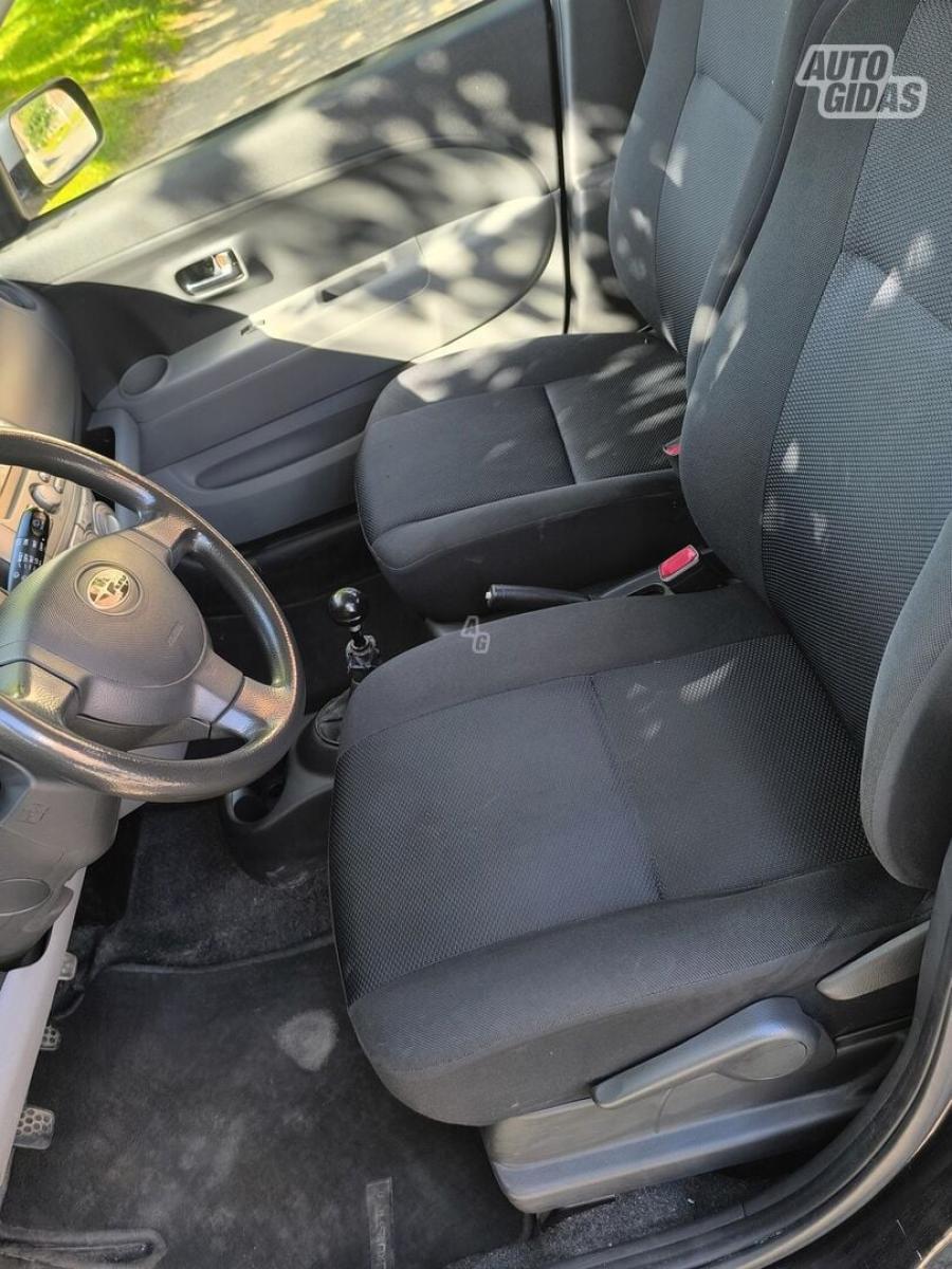 Black Subaru Justy 2007 in Klaipeda, with an engine capacity of 1.00 L and mileage of 202 thousand km for 1299 €, photo 11 on AUTOMOTO.COM.LV