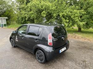 Black Subaru Justy 2008 in Riga, with an engine capacity of 1.00 L and mileage of 147 thousand km for 1350 €, photo 3 on AUTOMOTO.COM.LV