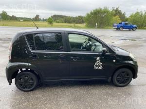 Black Subaru Justy 2008 in Riga, with an engine capacity of 1.00 L and mileage of 147 thousand km for 1350 €, photo 6 on AUTOMOTO.COM.LV