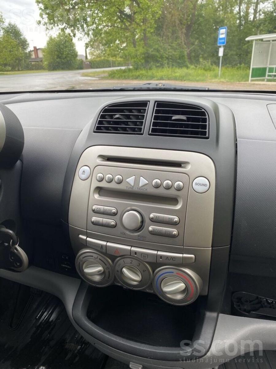 Black Subaru Justy 2008 in Riga, with an engine capacity of 1.00 L and mileage of 147 thousand km for 1350 €, photo 10 on AUTOMOTO.COM.LV