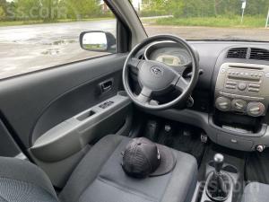 Black Subaru Justy 2008 in Riga, with an engine capacity of 1.00 L and mileage of 147 thousand km for 1350 €, photo 11 on AUTOMOTO.COM.LV