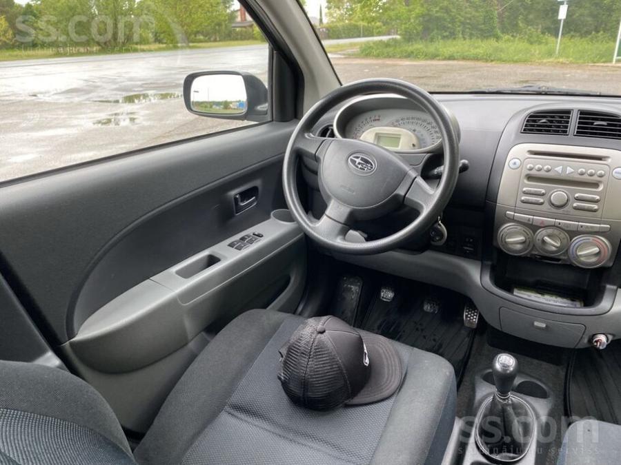 Black Subaru Justy 2008 in Riga, with an engine capacity of 1.00 L and mileage of 147 thousand km for 1350 €, photo 11 on AUTOMOTO.COM.LV