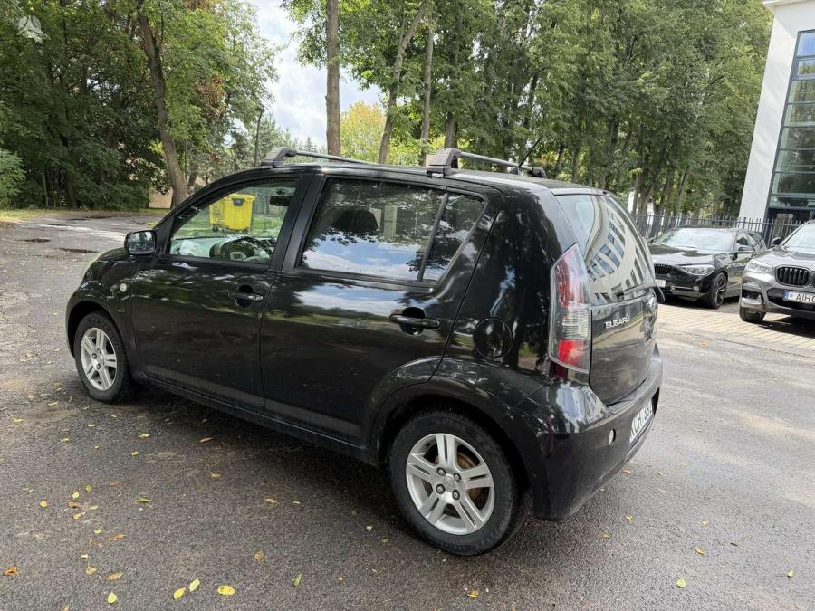 Melns Subaru Justy 2009 Kauņa, ar dzinēja tilpumu 1.00 L un nobraukumu 190 tūkst. km par 1100 €, foto 7 vietnē AUTOMOTO.COM.LV