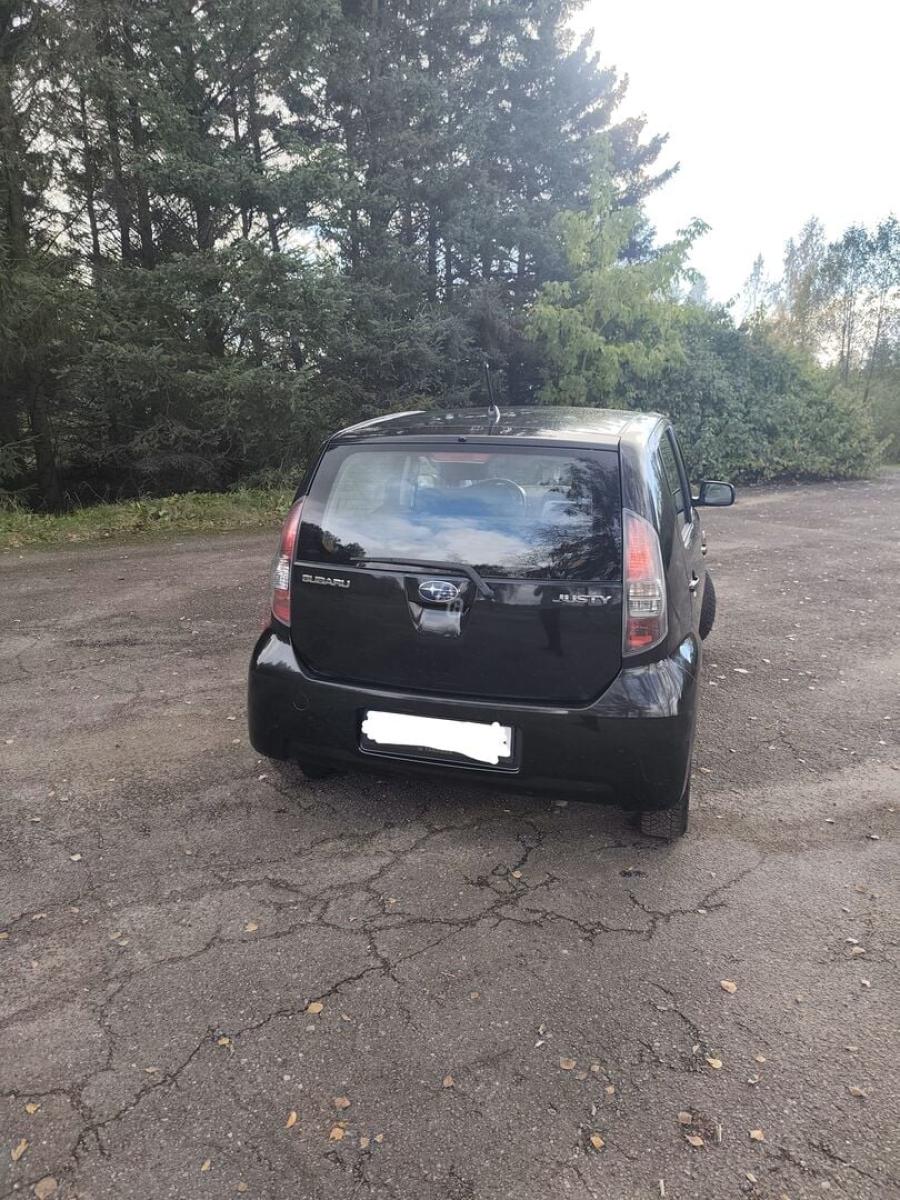 Black Subaru Justy 2009 in Silute, with an engine capacity of 1.00 L and mileage of 210 thousand km for 1650 €, photo 4 on AUTOMOTO.COM.LV