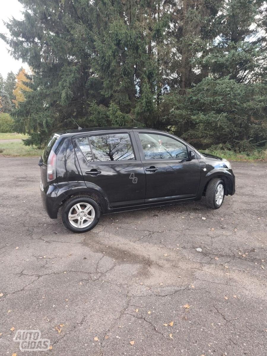 Black Subaru Justy 2009 in Silute, with an engine capacity of 1.00 L and mileage of 210 thousand km for 1650 €, photo 9 on AUTOMOTO.COM.LV