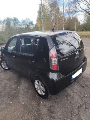 Black Subaru Justy 2009 in Silute, with an engine capacity of 1.00 L and mileage of 210 thousand km for 1650 €, photo 11 on AUTOMOTO.COM.LV
