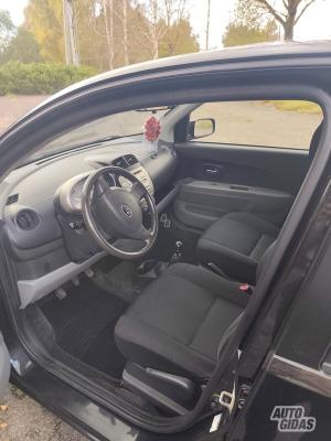 Black Subaru Justy 2009 in Silute, with an engine capacity of 1.00 L and mileage of 210 thousand km for 1650 €, photo 14 on AUTOMOTO.COM.LV