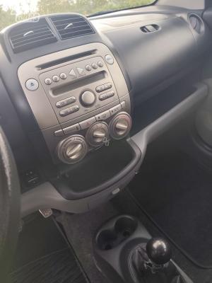 Black Subaru Justy 2009 in Silute, with an engine capacity of 1.00 L and mileage of 210 thousand km for 1650 €, photo 15 on AUTOMOTO.COM.LV