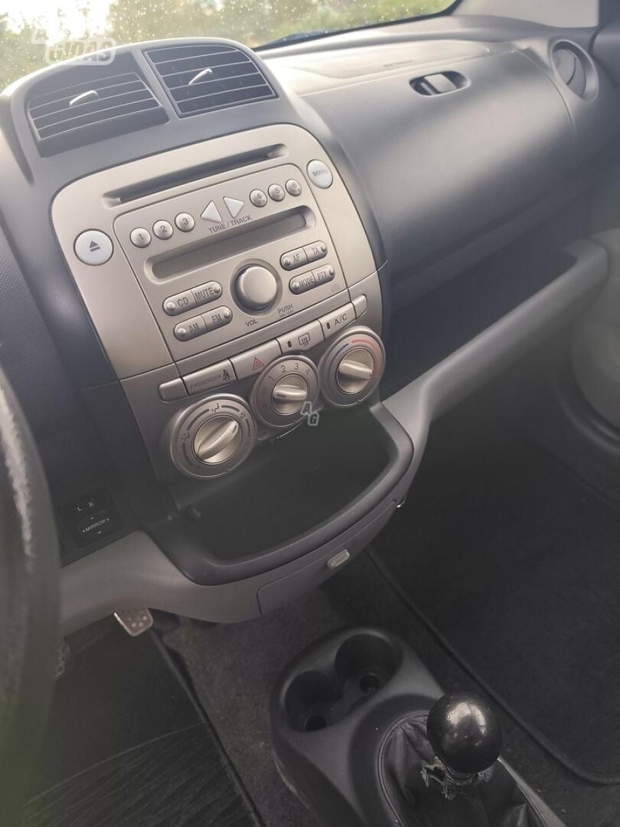 Black Subaru Justy 2009 in Silute, with an engine capacity of 1.00 L and mileage of 210 thousand km for 1650 €, photo 15 on AUTOMOTO.COM.LV
