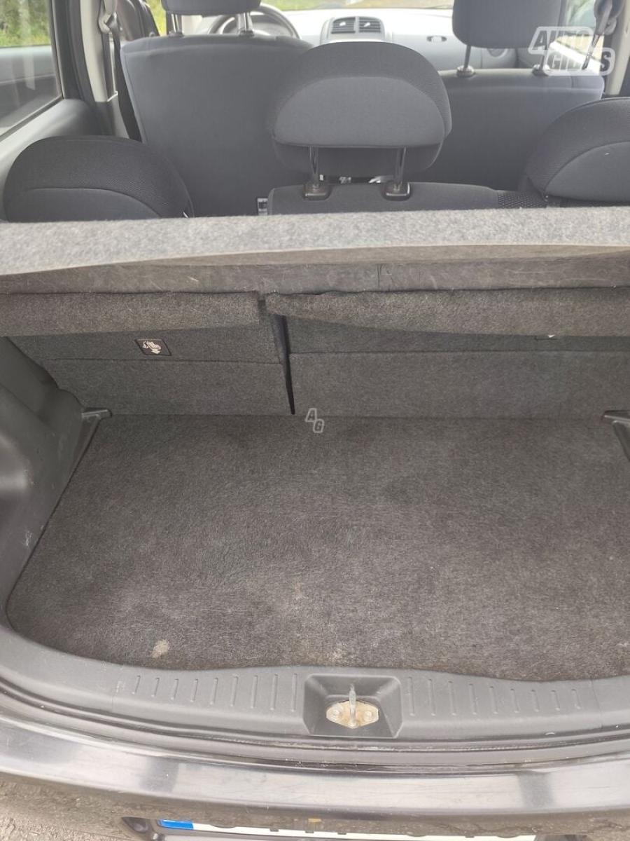 Black Subaru Justy 2009 in Silute, with an engine capacity of 1.00 L and mileage of 210 thousand km for 1650 €, photo 18 on AUTOMOTO.COM.LV