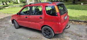 Red Subaru Justy 2006 in Vilnius, with an engine capacity of 1.33 L and mileage of 165 thousand km for 1950 €, photo 4 on AUTOMOTO.COM.LV