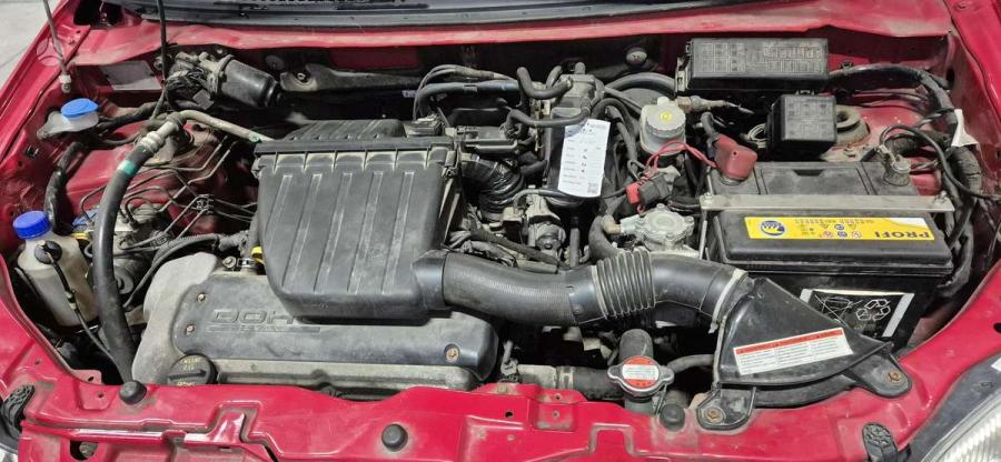 Red Subaru Justy 2006 in Vilnius, with an engine capacity of 1.33 L and mileage of 165 thousand km for 1950 €, photo 10 on AUTOMOTO.COM.LV