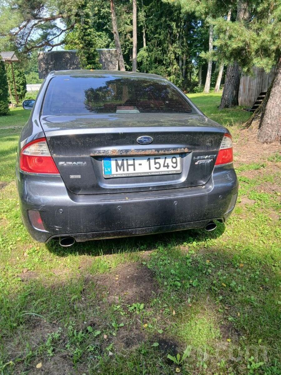 Black Subaru Legacy 2006 in Ogre, with an engine capacity of 2.00 L and mileage of 290 thousand km for 1630 €, photo 4 on AUTOMOTO.COM.LV