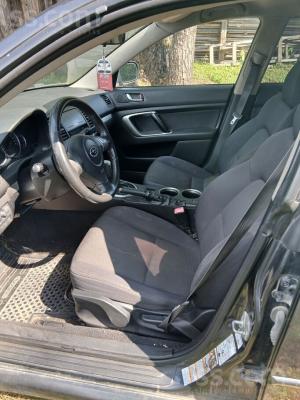 Black Subaru Legacy 2006 in Ogre, with an engine capacity of 2.00 L and mileage of 290 thousand km for 1630 €, photo 5 on AUTOMOTO.COM.LV