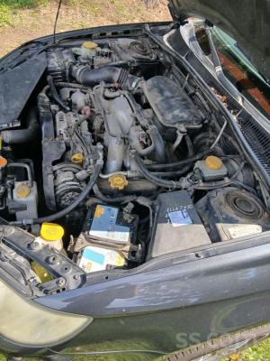 Black Subaru Legacy 2006 in Ogre, with an engine capacity of 2.00 L and mileage of 290 thousand km for 1630 €, photo 6 on AUTOMOTO.COM.LV