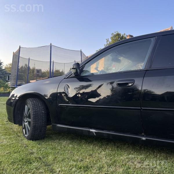 Black Subaru Legacy 2005 in Riga, with an engine capacity of 2.50 L and mileage of 285 thousand km for 1300 €, photo 5 on AUTOMOTO.COM.LV