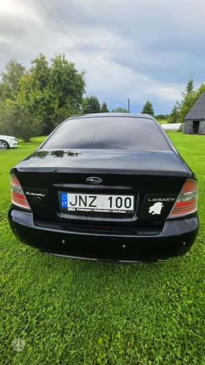 Black Subaru Legacy 2005 in Visaginas, with an engine capacity of 2.46 L and mileage of 392 thousand km for 1500 €, photo 11 on AUTOMOTO.COM.LV
