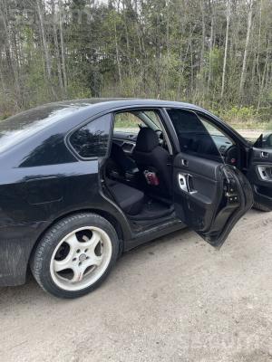 Black Subaru Legacy 2007 in Riga, with an engine capacity of 2.00 L and mileage of 327 thousand km for 1600 €, photo 7 on AUTOMOTO.COM.LV