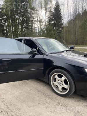 Black Subaru Legacy 2007 in Riga, with an engine capacity of 2.00 L and mileage of 327 thousand km for 1600 €, photo 8 on AUTOMOTO.COM.LV