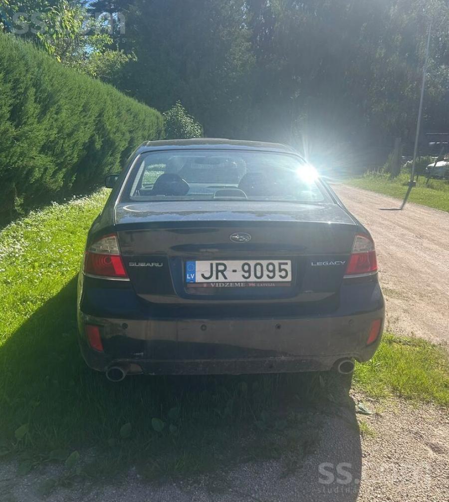 Black Subaru Legacy 2008 in Ogre, with an engine capacity of 2.50 L and mileage of 400 thousand km for 400 €, photo 5 on AUTOMOTO.COM.LV