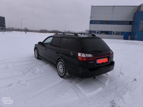 Black Subaru Legacy 2002 in Panevezys, with an engine capacity of 2.50 L and mileage of 262 thousand km for 2100 €, photo 2 on AUTOMOTO.COM.LV