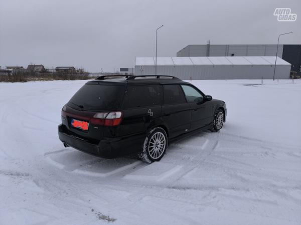 Black Subaru Legacy 2002 in Panevezys, with an engine capacity of 2.50 L and mileage of 262 thousand km for 2100 €, photo 4 on AUTOMOTO.COM.LV
