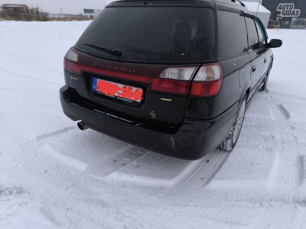 Black Subaru Legacy 2002 in Panevezys, with an engine capacity of 2.50 L and mileage of 262 thousand km for 2100 €, photo 6 on AUTOMOTO.COM.LV