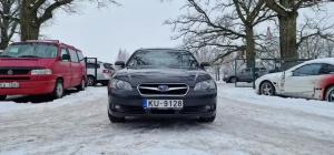 Melns Subaru Legacy 2003 Valmiera, ar dzinēja tilpumu 2.50 L un nobraukumu 281 tūkst. km par 1550 €, foto 3 vietnē AUTOMOTO.COM.LV