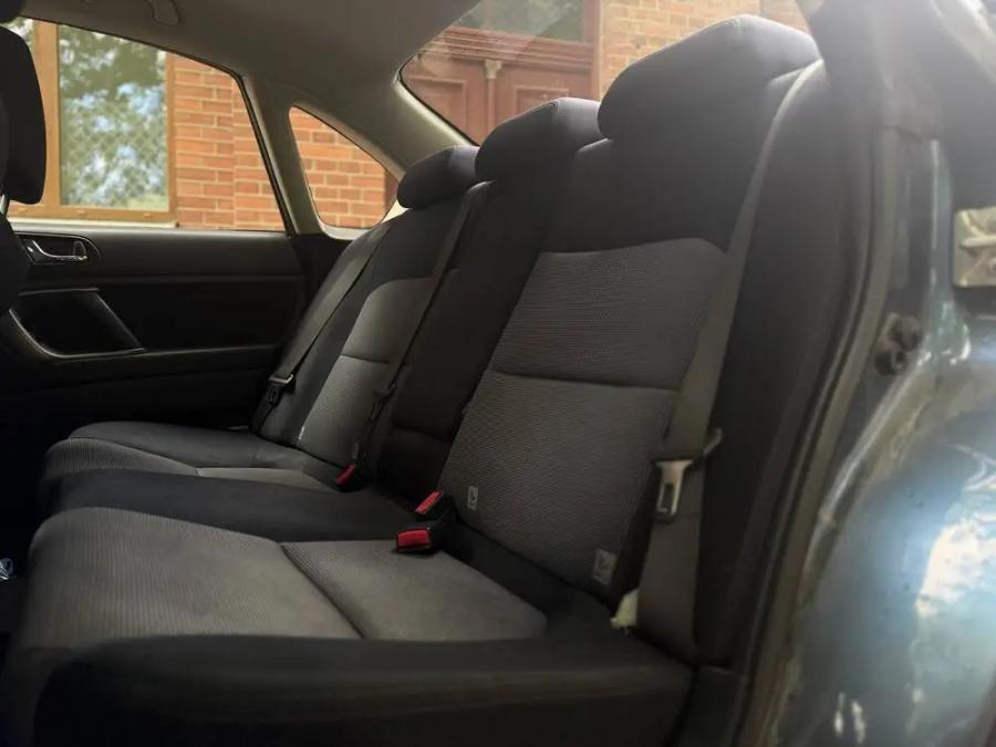 Blue Subaru Legacy 2005 in Cesis, with an engine capacity of 2.00 L and mileage of 387 thousand km for 1290 €, photo 18 on AUTOMOTO.COM.LV