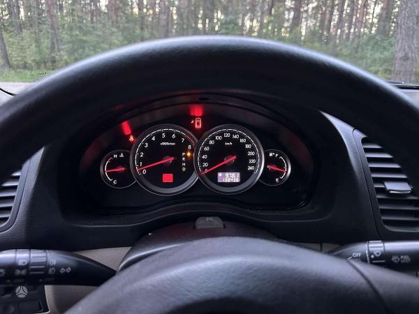 Blue Subaru Legacy 2010 in Vilnius, with an engine capacity of 2.46 L and mileage of 138 thousand km for 1200 €, photo 11 on AUTOMOTO.COM.LV