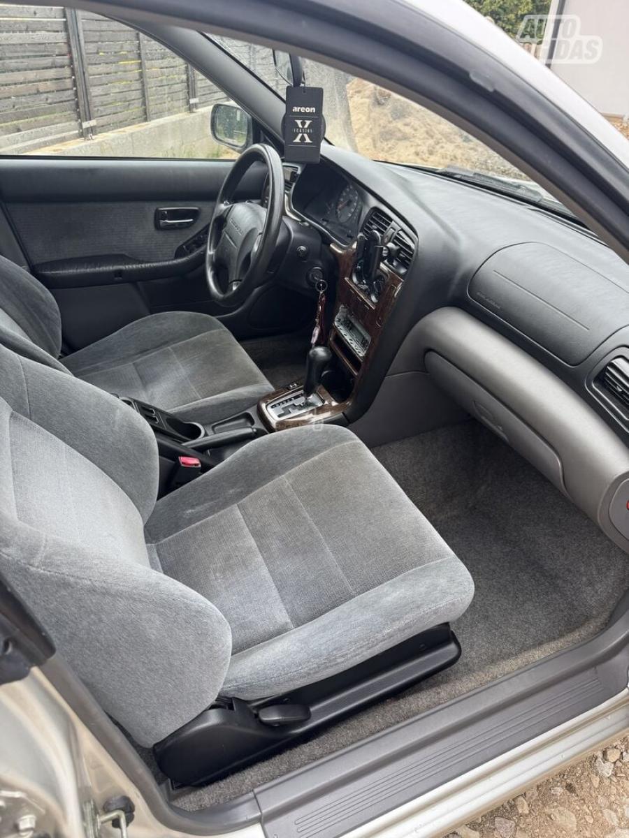 Grey Subaru Legacy 1999 in Vilnius, with an engine capacity of 2.00 L and mileage of 272 thousand km for 1399 €, photo 8 on AUTOMOTO.COM.LV
