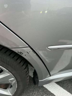 Grey Subaru Legacy 2009 in Vilnius, with an engine capacity of 2.00 L and mileage of 298 thousand km for 2000 €, photo 17 on AUTOMOTO.COM.LV