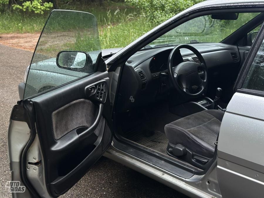 Grey Subaru Legacy 1996 in Jurbarkas, with an engine capacity of 2.20 L and mileage of 281 thousand km for 2150 €, photo 7 on AUTOMOTO.COM.LV