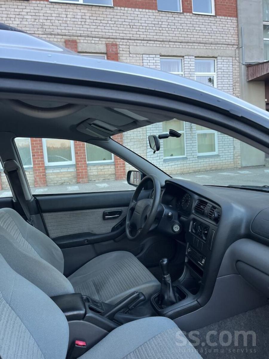 Grey Subaru Legacy 2000 in Valmiera, with an engine capacity of 2.00 L and mileage of 225 thousand km for 2250 €, photo 10 on AUTOMOTO.COM.LV