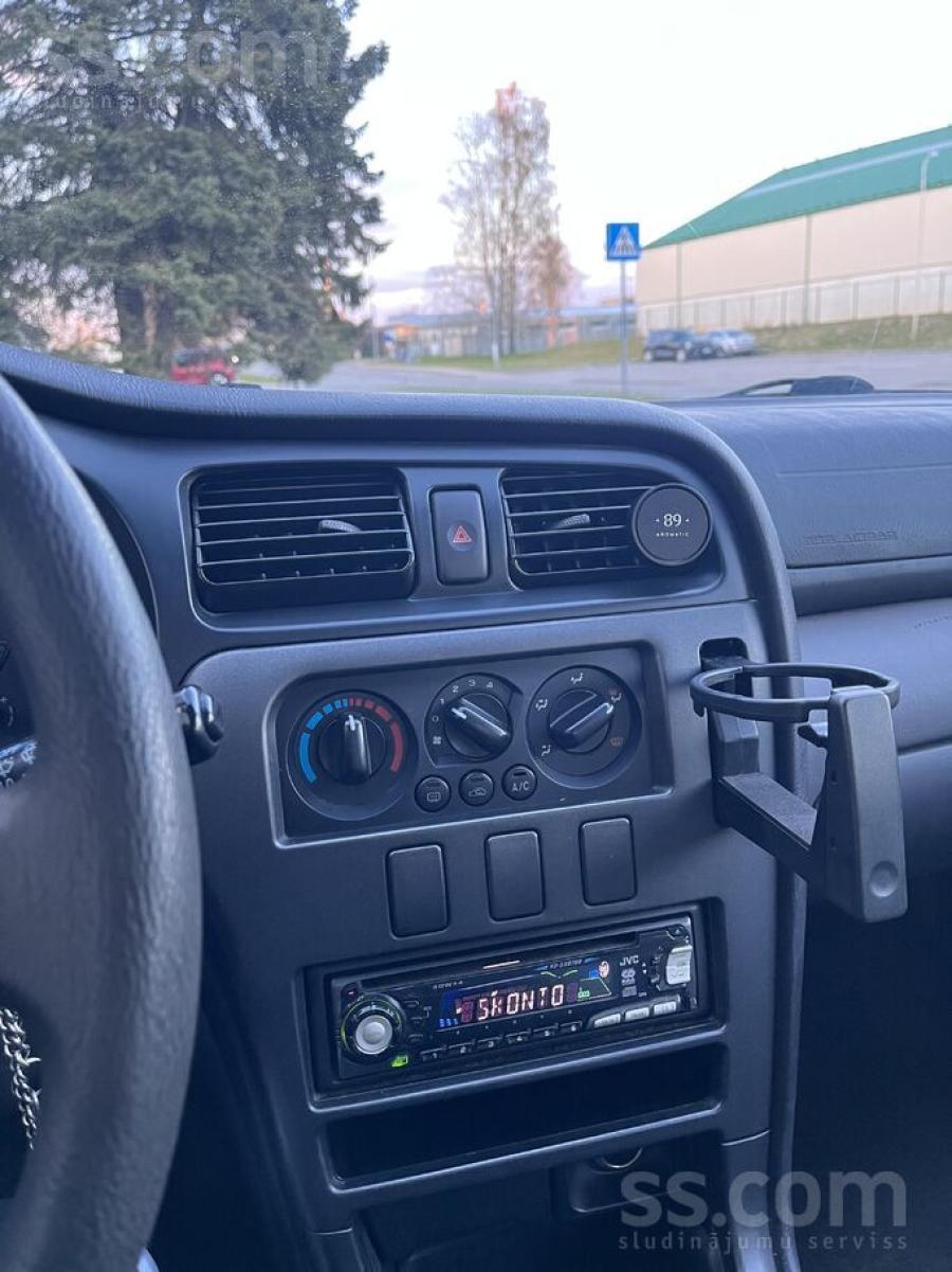 Grey Subaru Legacy 2000 in Valmiera, with an engine capacity of 2.00 L and mileage of 225 thousand km for 2250 €, photo 12 on AUTOMOTO.COM.LV