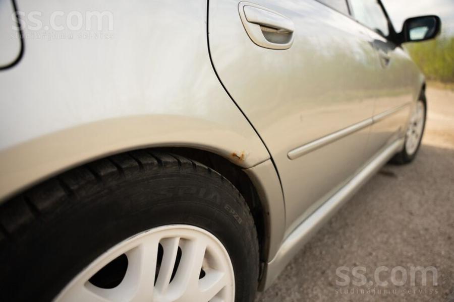 Pelēks Subaru Legacy 2006 Rīga, ar dzinēja tilpumu 2.00 L un nobraukumu 347 tūkst. km par 2000 €, foto 16 vietnē AUTOMOTO.COM.LV