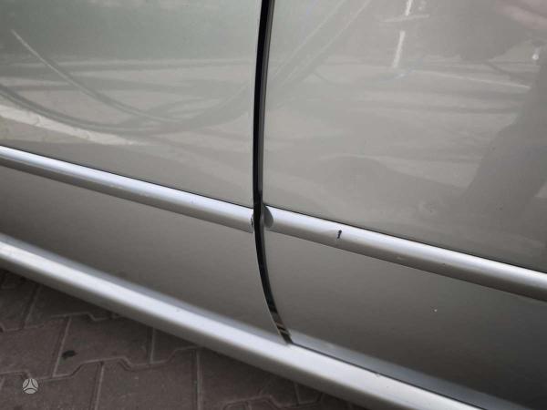 Grey Subaru Legacy 2006 in Vilnius, with an engine capacity of 1.99 L and mileage of 272 thousand km for 2650 €, photo 9 on AUTOMOTO.COM.LV