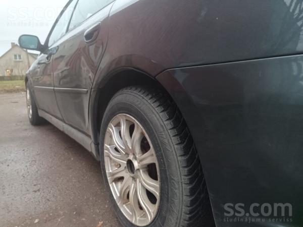 Pelēks Subaru Legacy 2007 Rīga, ar dzinēja tilpumu 2.00 L un nobraukumu 194 tūkst. km par 3000 €, foto 9 vietnē AUTOMOTO.COM.LV