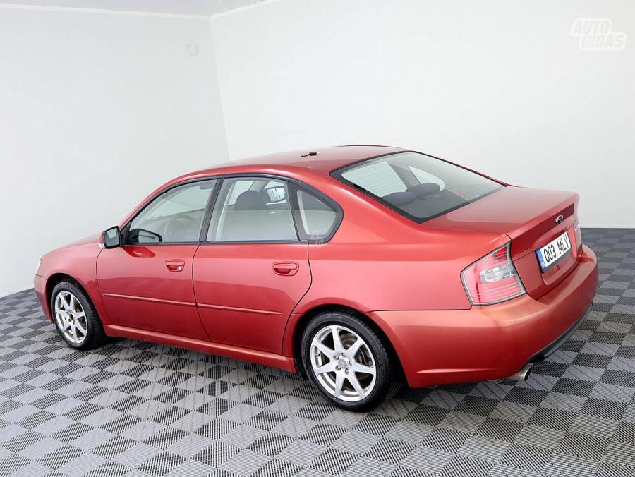 Red Subaru Legacy 2005 in Tallinn, with an engine capacity of 2.00 L and mileage of 322 thousand km for 1299 €, photo 4 on AUTOMOTO.COM.LV