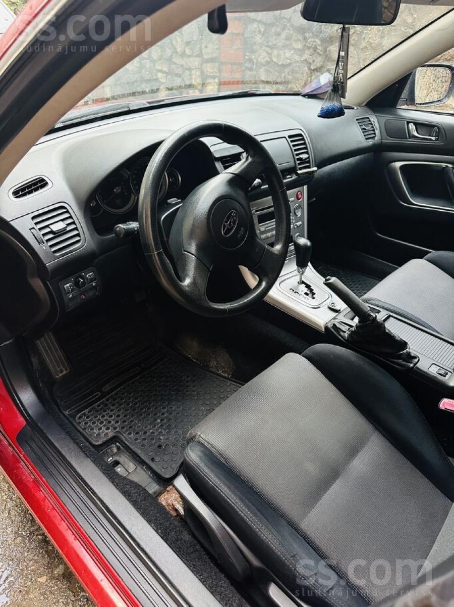 Red Subaru Legacy 2005 in Riga, with an engine capacity of 2.00 L and mileage of 298 thousand km for 1650 €, photo 5 on AUTOMOTO.COM.LV