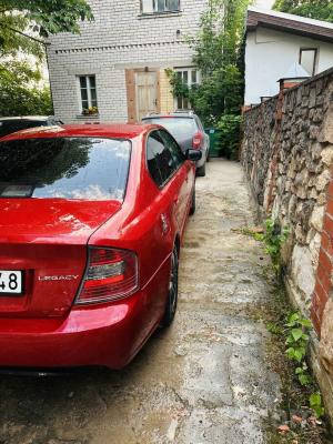 Red Subaru Legacy 2005 in Riga, with an engine capacity of 2.00 L and mileage of 298 thousand km for 1650 €, photo 8 on AUTOMOTO.COM.LV